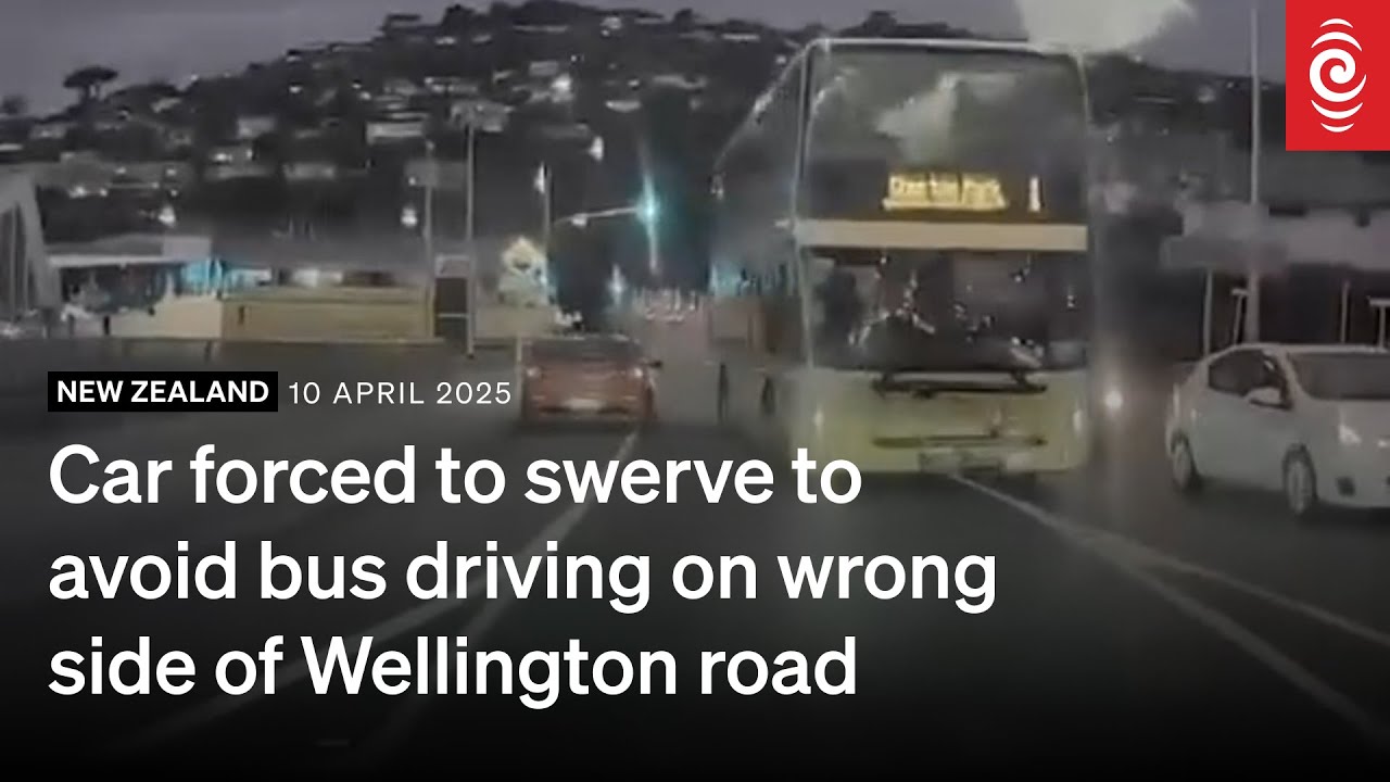 Car forced to swerve to avoid bus driving on wrong side of Wellington ...