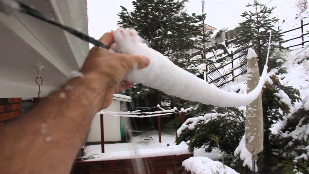 Snow on a telephone wire - Please Do Not touch ANY overhead wires ...