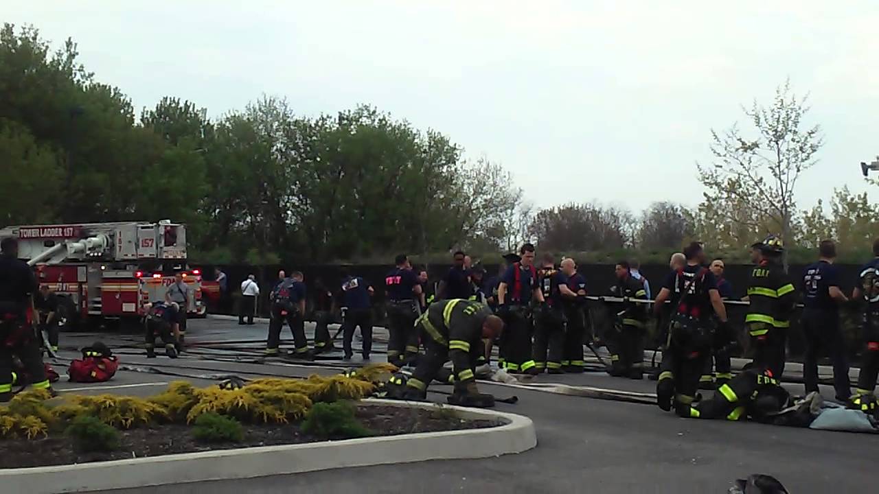 FDNY Firefighters Packing Up Hose After A 3 Alarm Brush Fire - YouTube