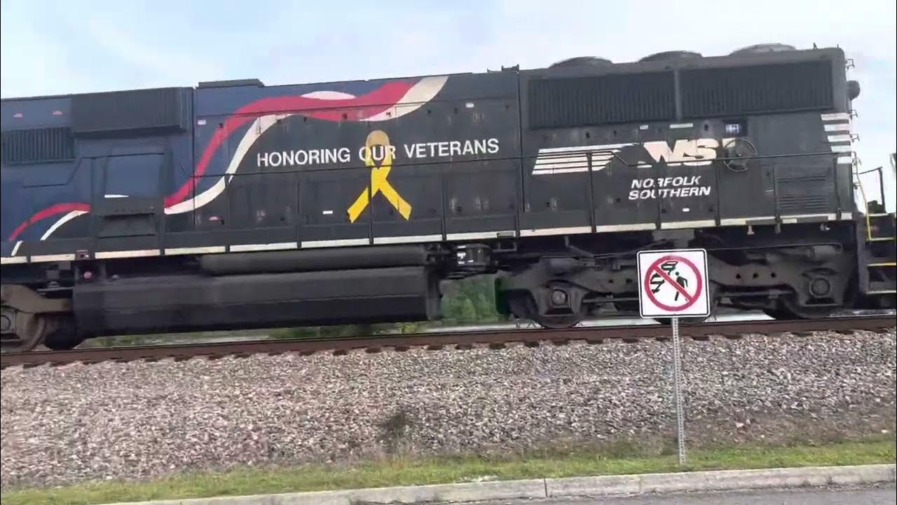 NS 6920 leads NS 105 with BNSF power trailing - YouTube