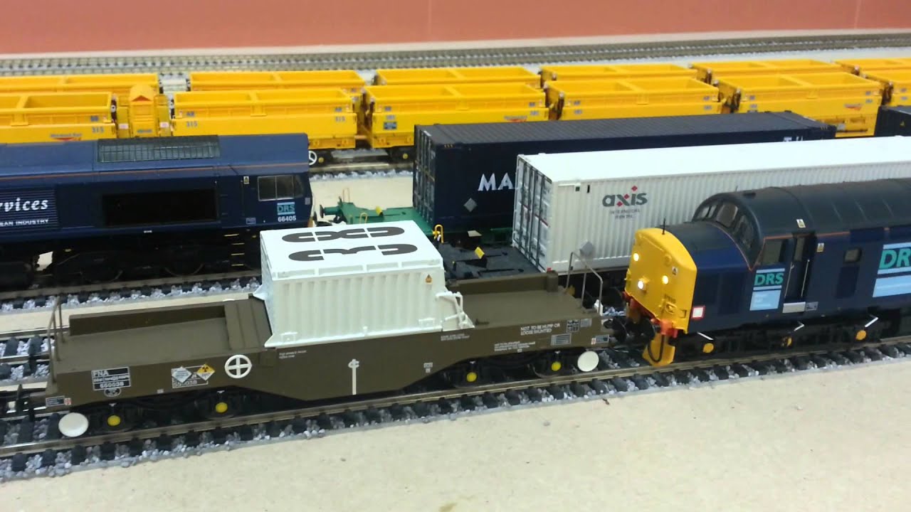 Bachmann Twin DRS 37's pulling 3 FNA Nuclear Wagons - YouTube