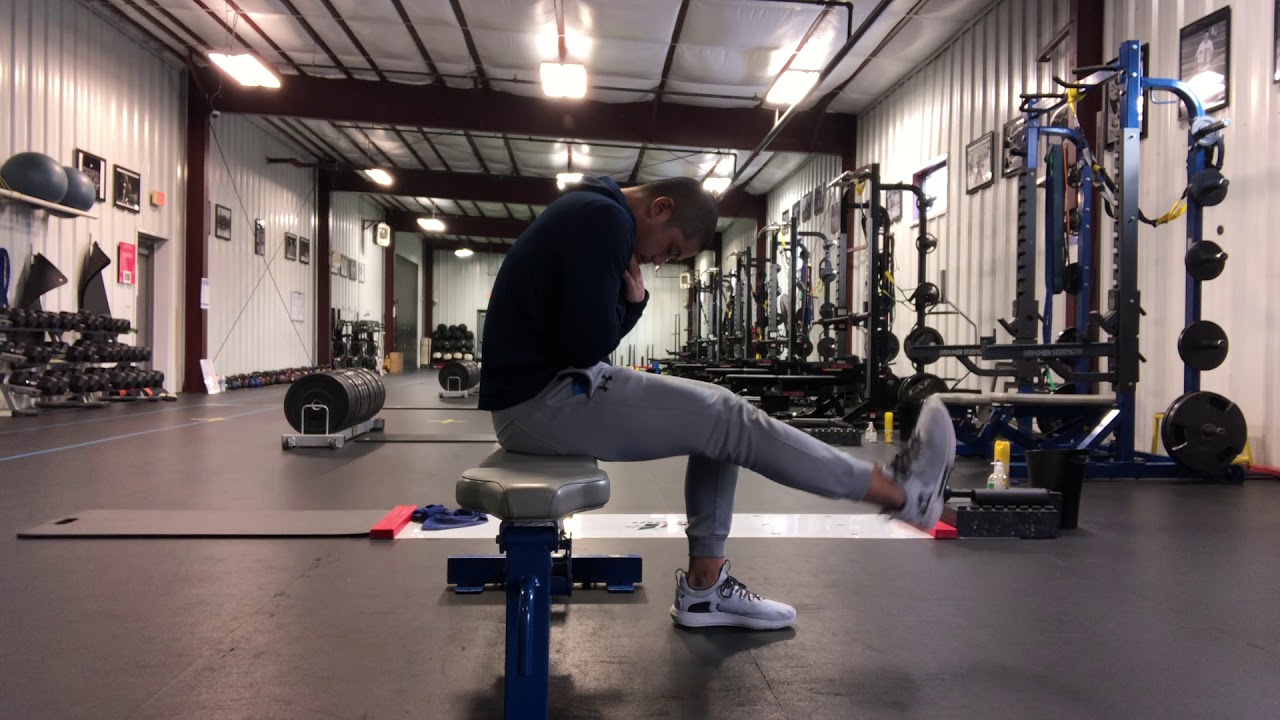 seated slump leg extensions - YouTube