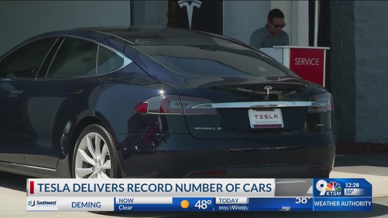 Tesla delivers record number of cars - YouTube