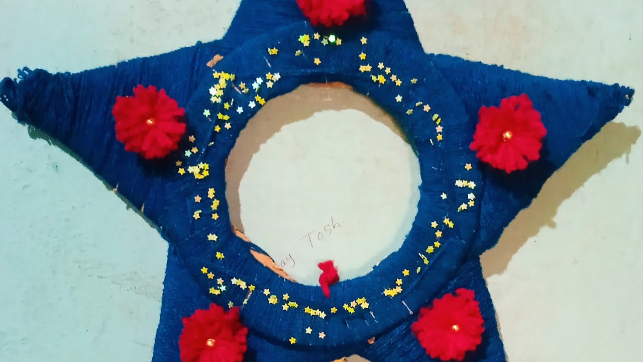 Amazing star design with whool.... woollen crafts for wall hanging ...