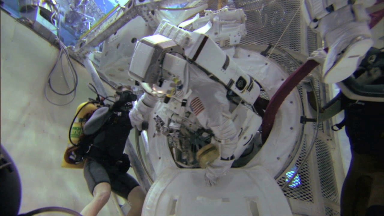 astronaut in training underwater - YouTube
