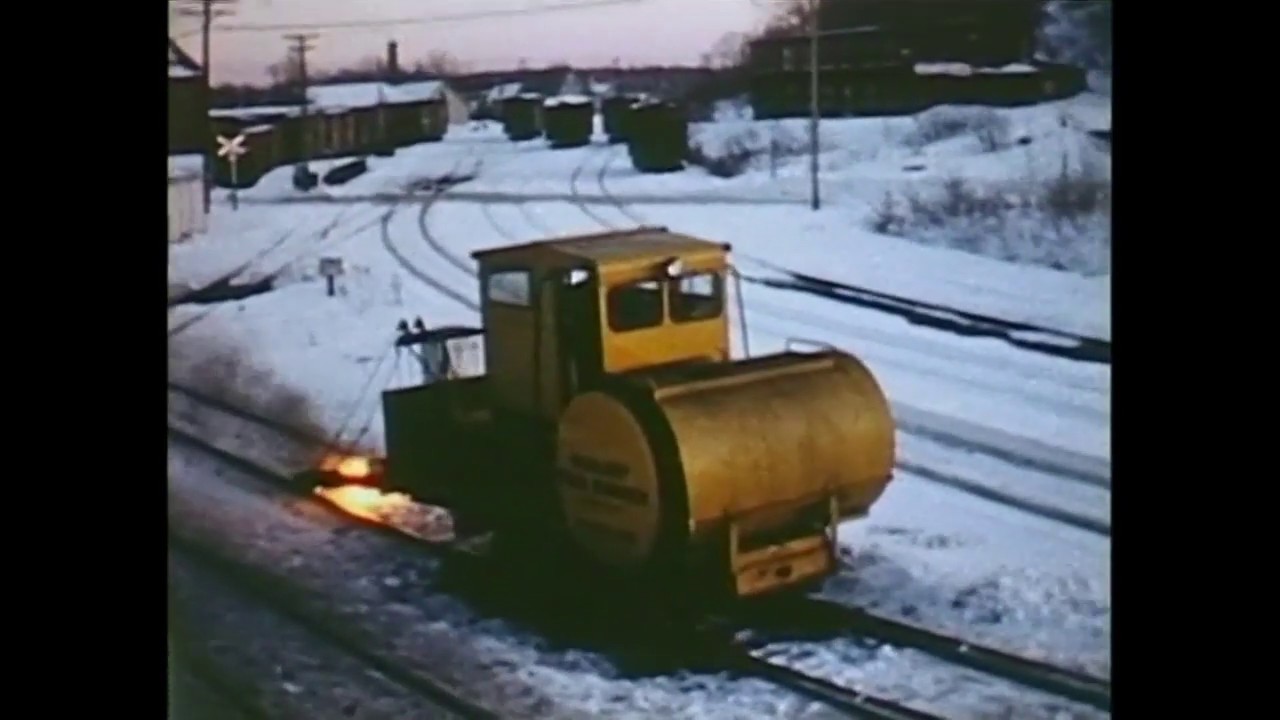 B&M Snow Melter Clearing Snow and Ice on the Railroad Tracks - YouTube