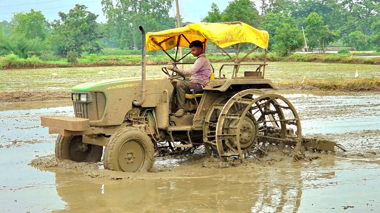 John deere 5055e || #puddling with double cage wheel || #5310 - YouTube