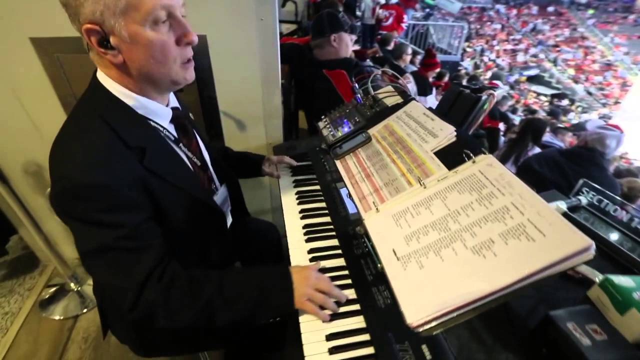 Video: New Jersey Devils organist keeps hockey tradition alive - YouTube