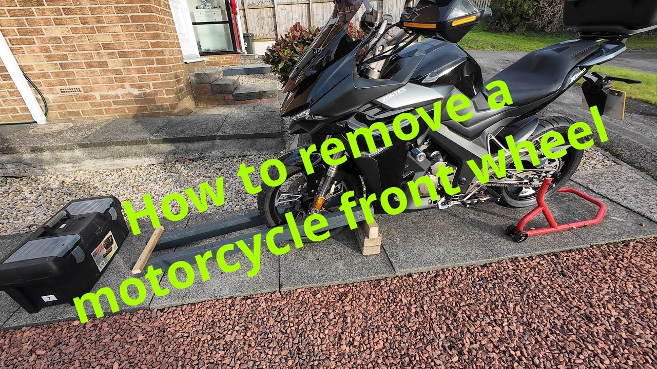 How to remove a motorcycle front wheel without a front paddock stand ...