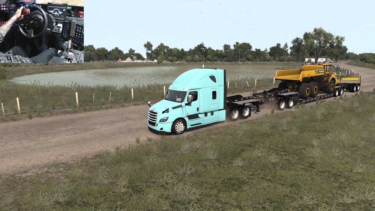 Delivering a Volvo A25G with lovely Cascadia in Oklahoma City - YouTube
