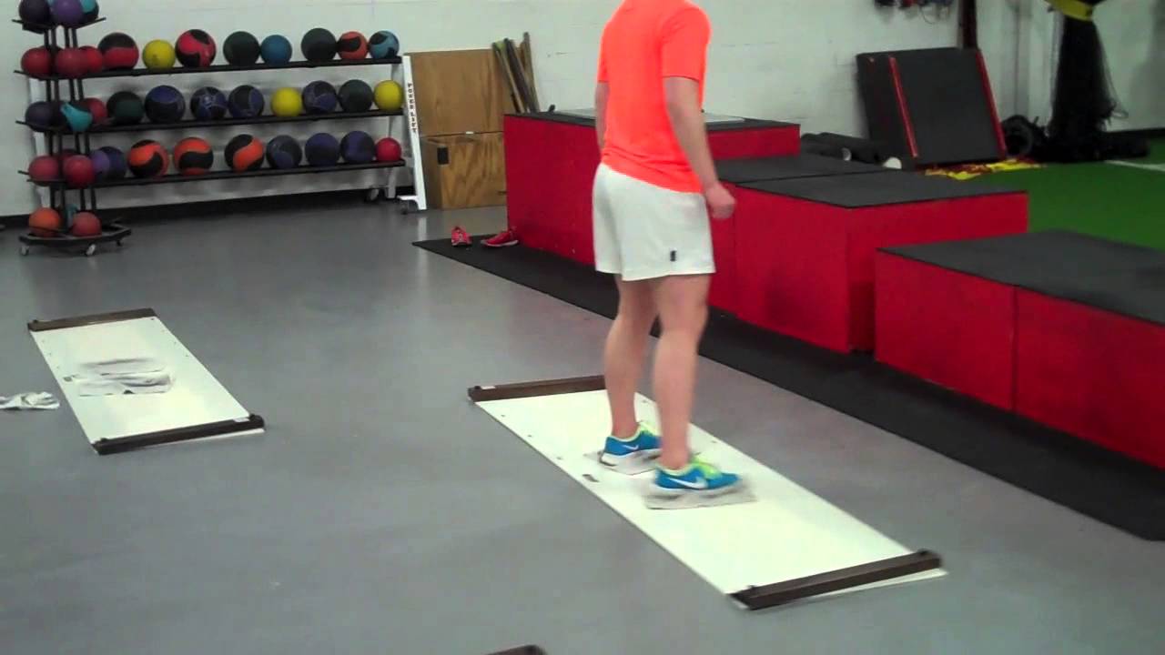 Standing slideboard adductor squeeze - YouTube