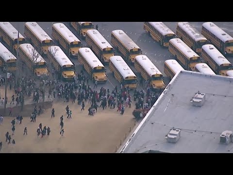 Students evacuate after McEachern High School shooting: Raw chopper ...