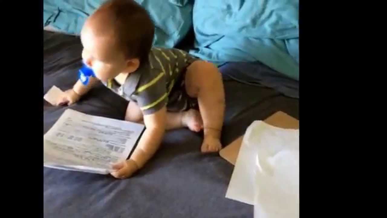 Cute baby doing paperwork. - YouTube