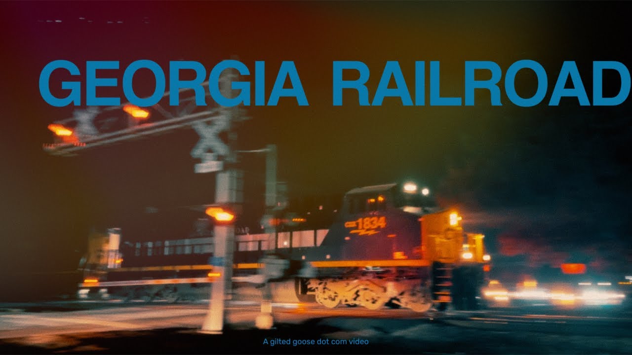 CSX1834 Georgia Railroad: A CSX heritage unit holds up a fire truck ...