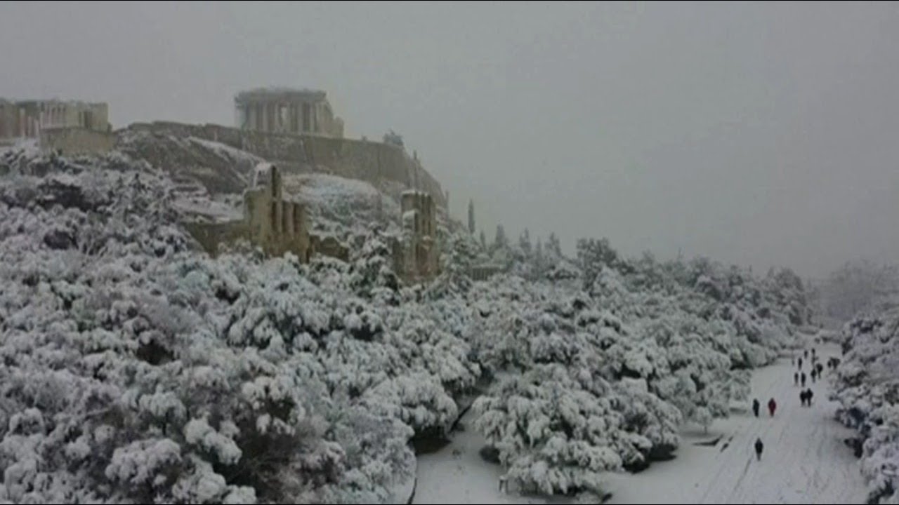 Athens sees most intense snowfall in a decade - YouTube