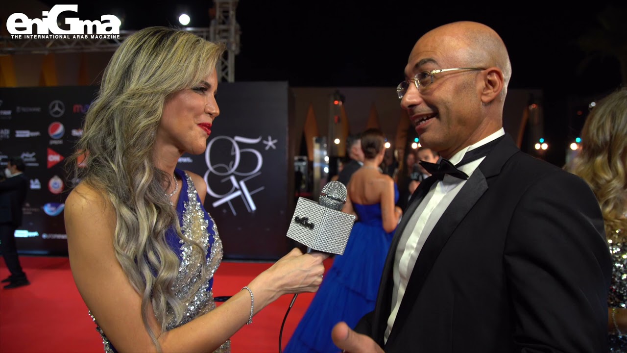 YASSER SHAKER WITH ENIGMA ON EL GOUNA FILM FESTIVAL RED CARPET - YouTube