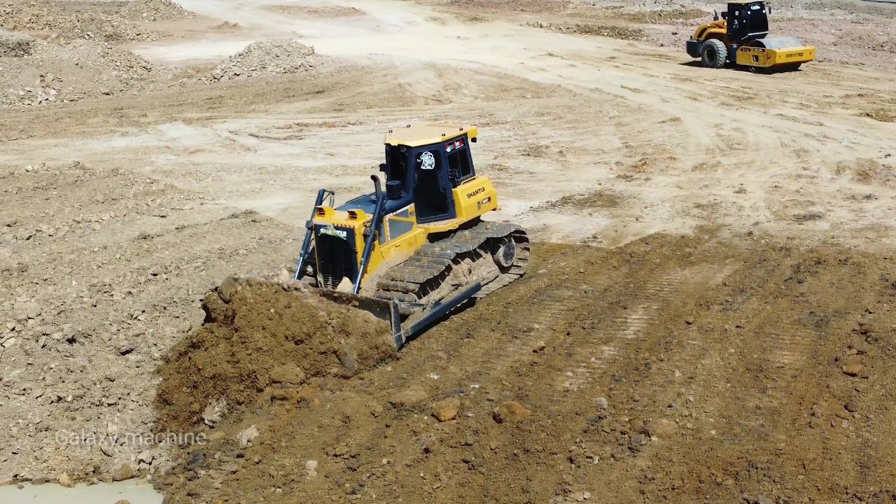 Dump track Transport soil and Heavy Bulldozer SHANTUI DH17C2 pushing ...