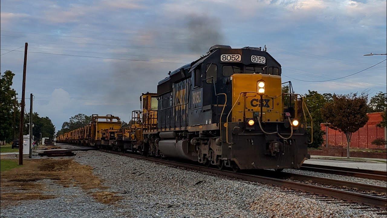 CSX SD40-2 8052 Smoking and Notching Up leading CSX W021-04 SB by Dunn, NC - YouTube