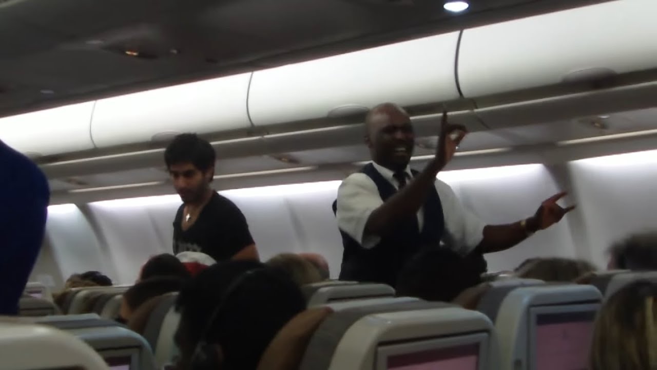 South African Flight Attendant Dancing For New Year on Airplane - YouTube