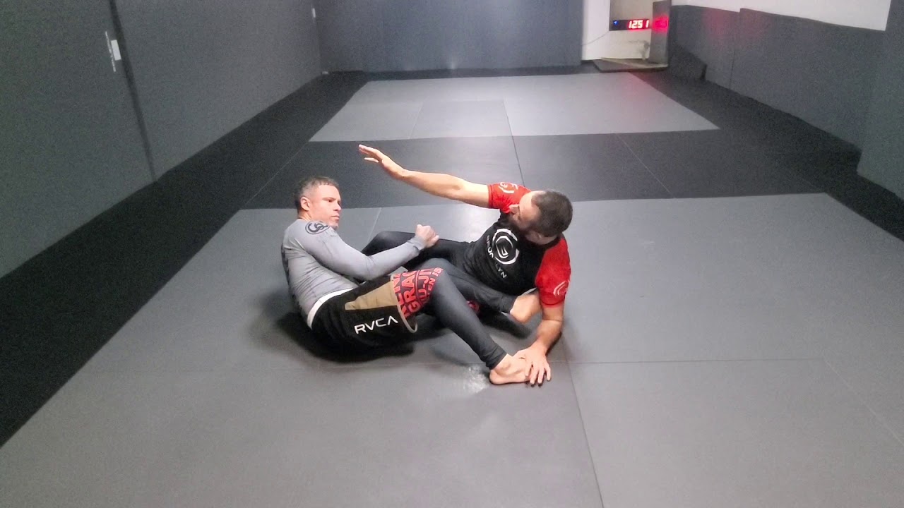 Imanari roll to inside sankaku and ashi garami, toe hold and heel hook ...