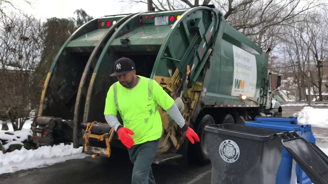 Waste Management Garbage trucks in the snow - YouTube