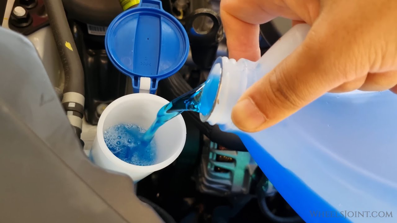 How to refill windshield washer fluid in Kia Sportage - YouTube