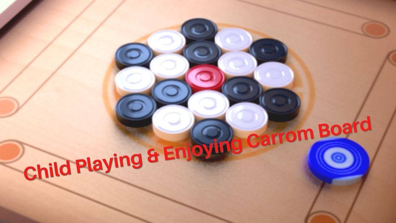 Playing & Enjoying Carrom Board | Child is busy playing Carrom Board in ...