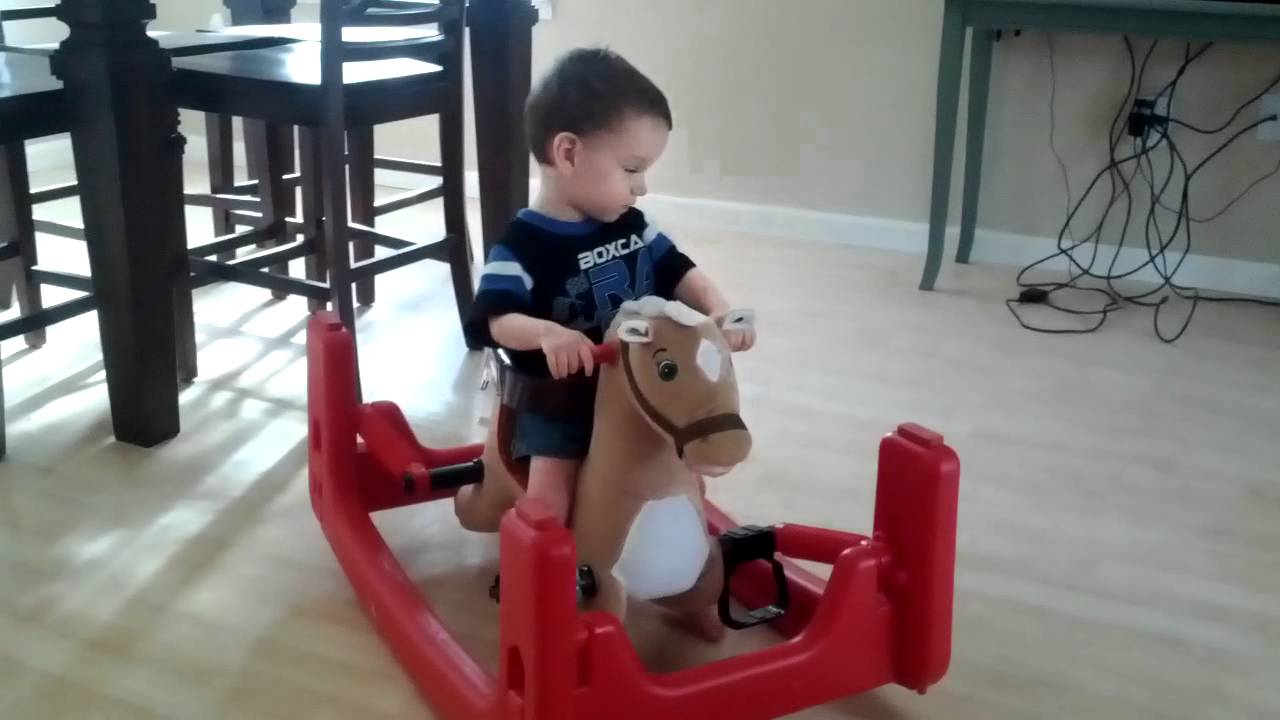 Nikolas riding his pony. Giddy up... - YouTube