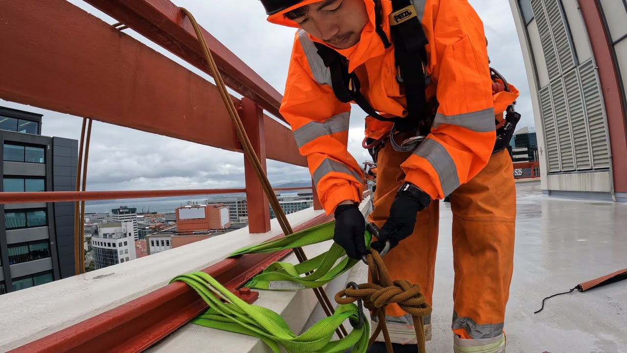 Rope access technician rigging double figure 8 knot for drop. - YouTube