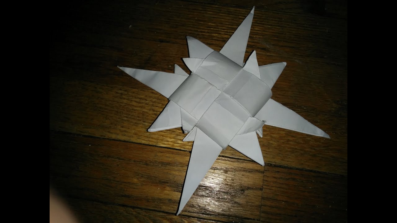 How to combine origami ninja stars to the pinwheel ninja star - YouTube