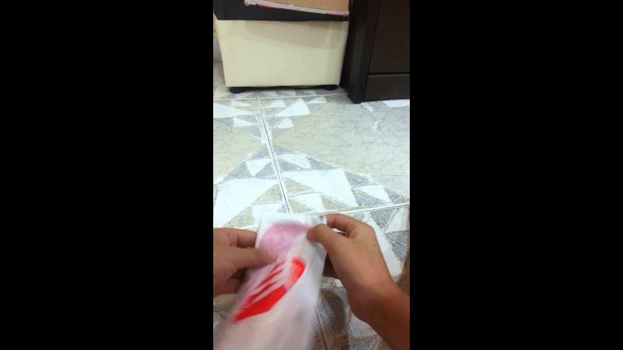 How to fold a plastic bag into a square - YouTube
