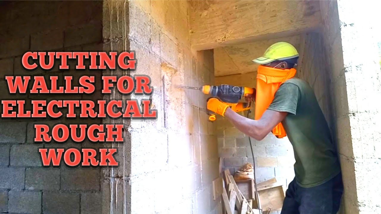 Building a House In Jamaica Cutting Walls For Electrical Work Before ...