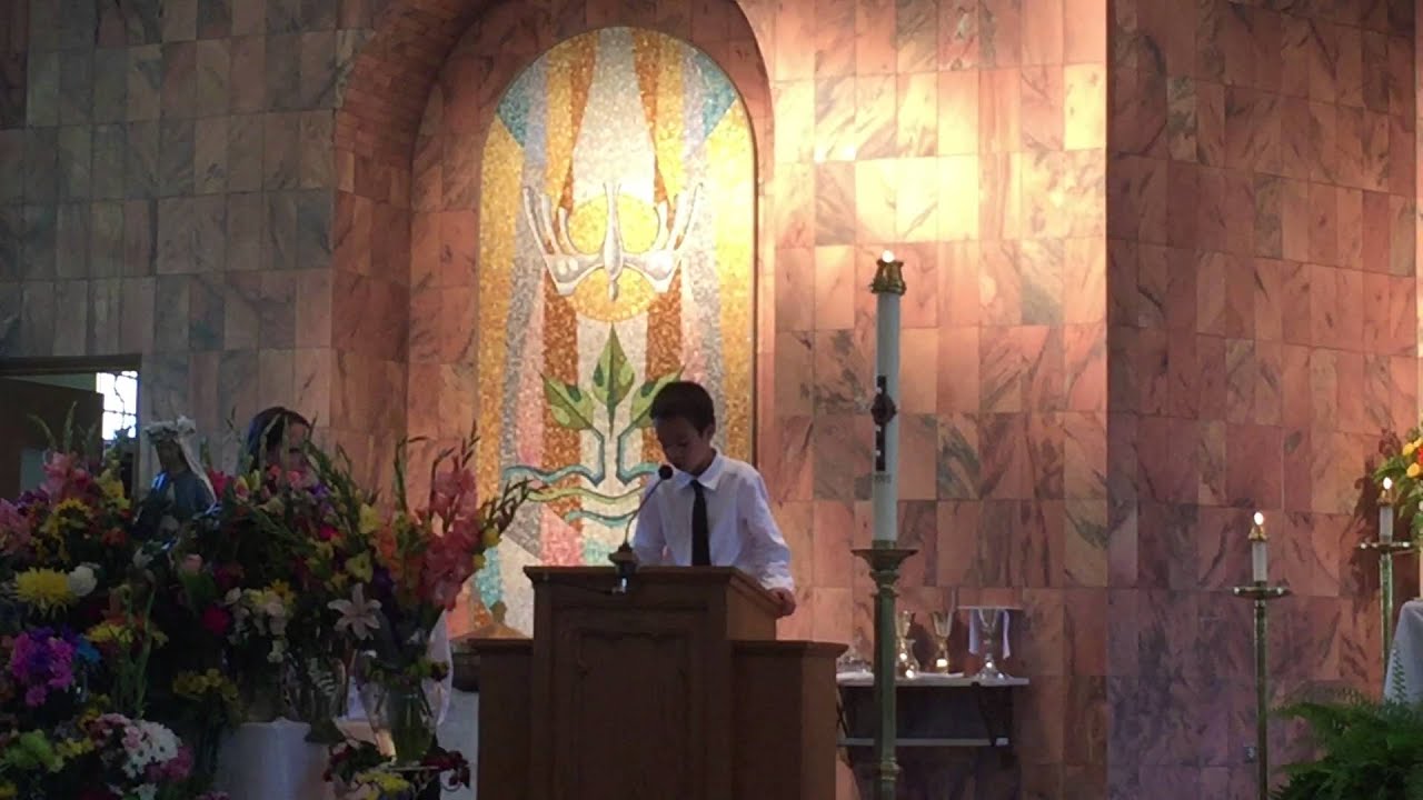 Reading the 1st reading at Mass, for his 1st communion - YouTube