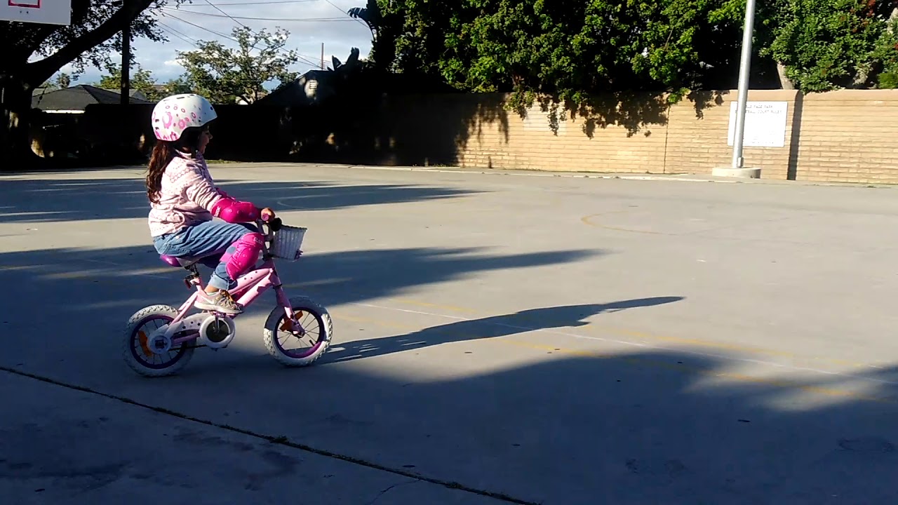 Sophia riding bike without training wheels - YouTube