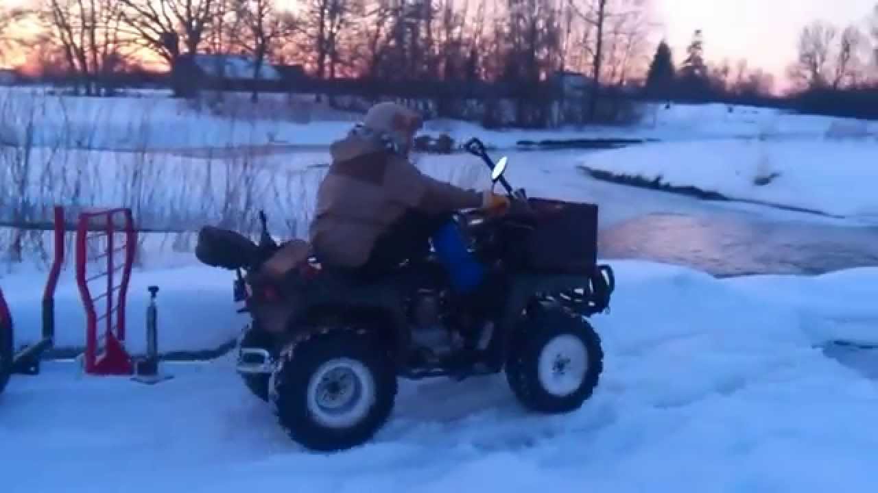 Winter logging with my ATV - YouTube