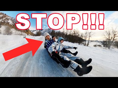 MOM GOES OFF GIANT CLIFF SLEDDING
