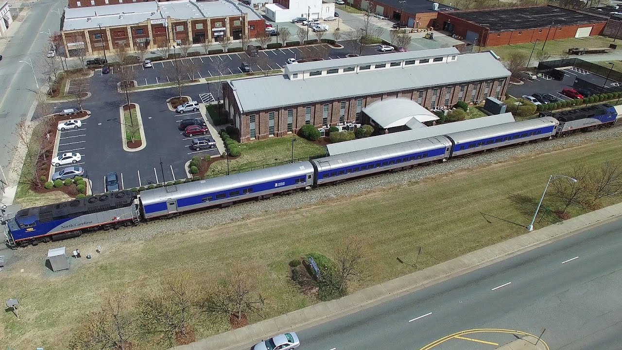 Aerial View of Amtrak #74 Carolinian Arriving & Departing Main St ...