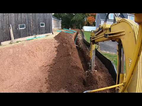 digging sump pump trench - YouTube