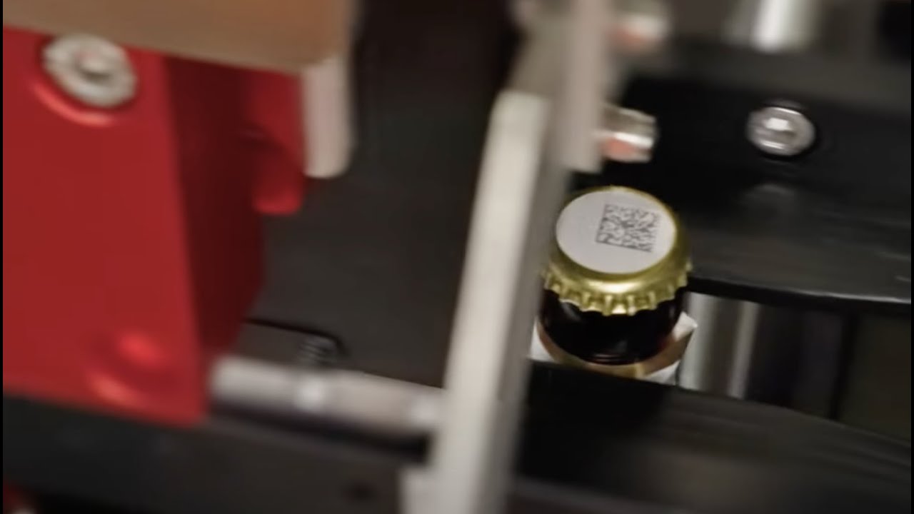 Printing 2D codes onto beer bottle crown tops | Array Graphics | Norwix ...