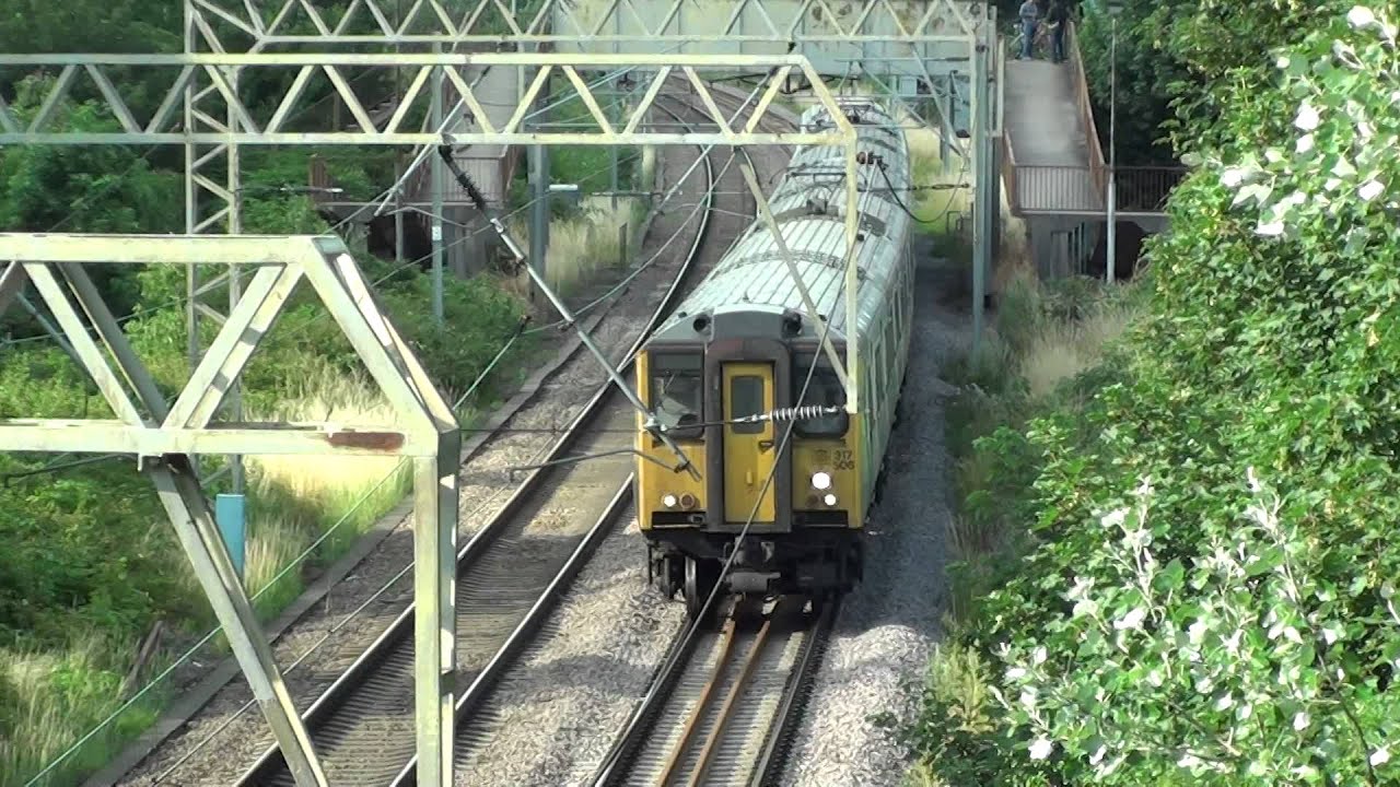 (HD) A pair of Greater Anglia Class 317's pass down the West Anglia ...