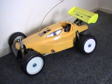 Graupner Impuls 2000 2wd on a racetrack (HoBao Pirate, Kyosho Prestige ...