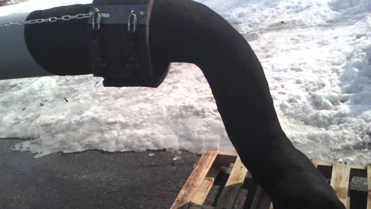 Silt sock auger bucket filling short piece of 12" silt sock - YouTube