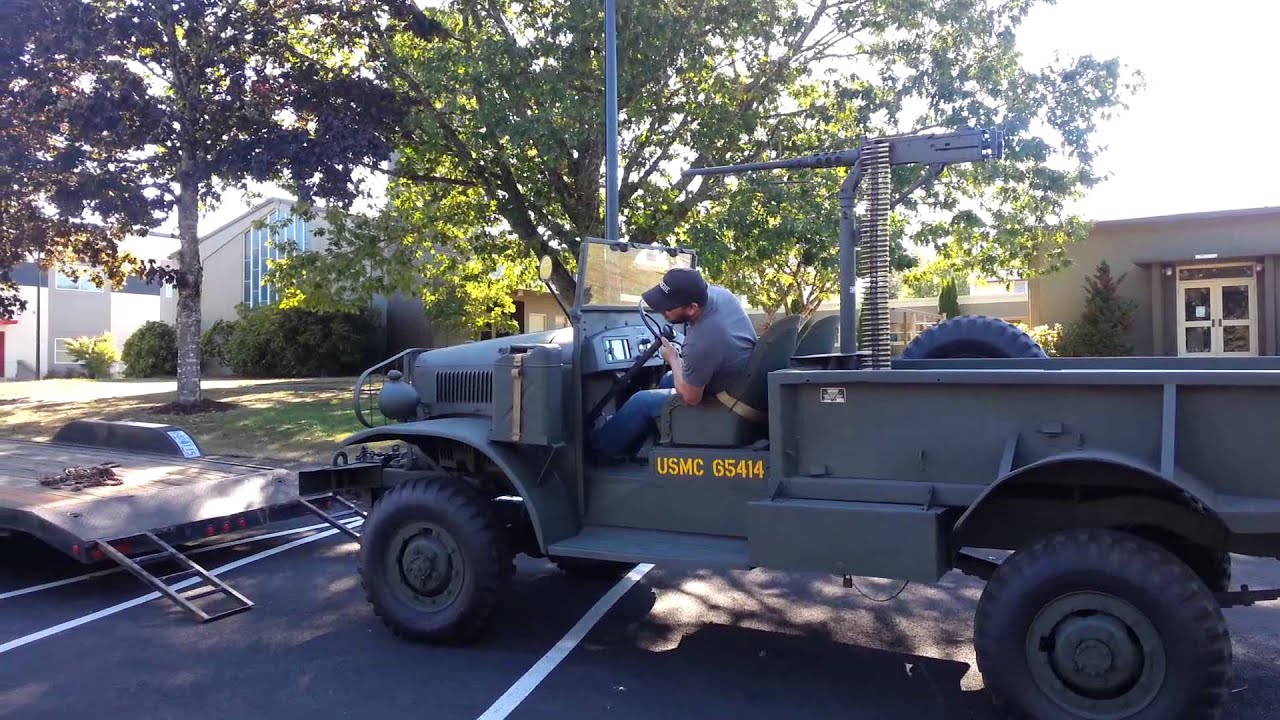 Loading a WWII International M-2-4 on a trailer - YouTube