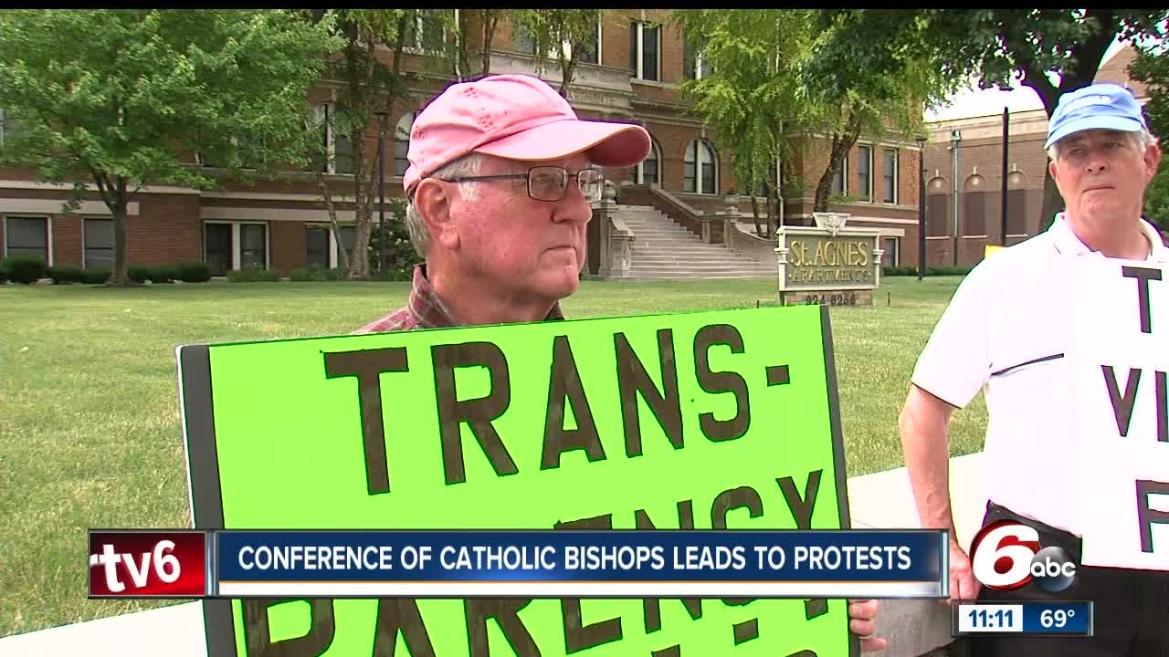 Church Divided: Protestors gather during conference for Catholic ...