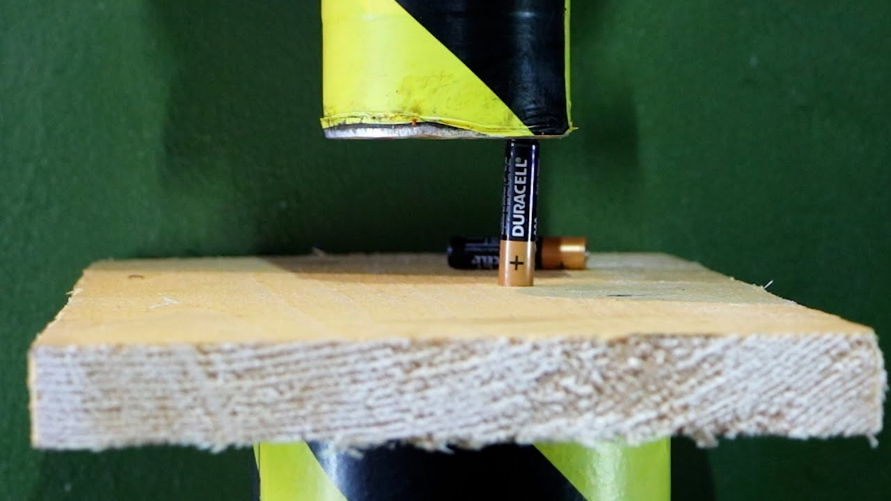What Happens When a Battery is Pressed Into Wood? - YouTube