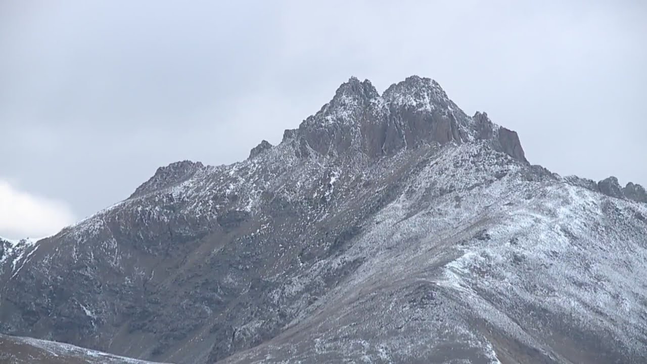 Snow beginning to fall in Colorado’s high country - YouTube