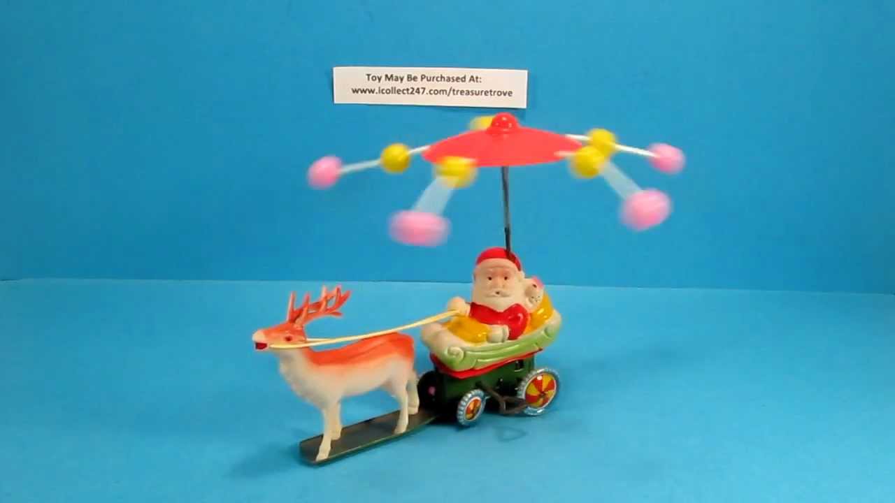 Santa on Sleigh with Carousel Wind Up Toy - YouTube