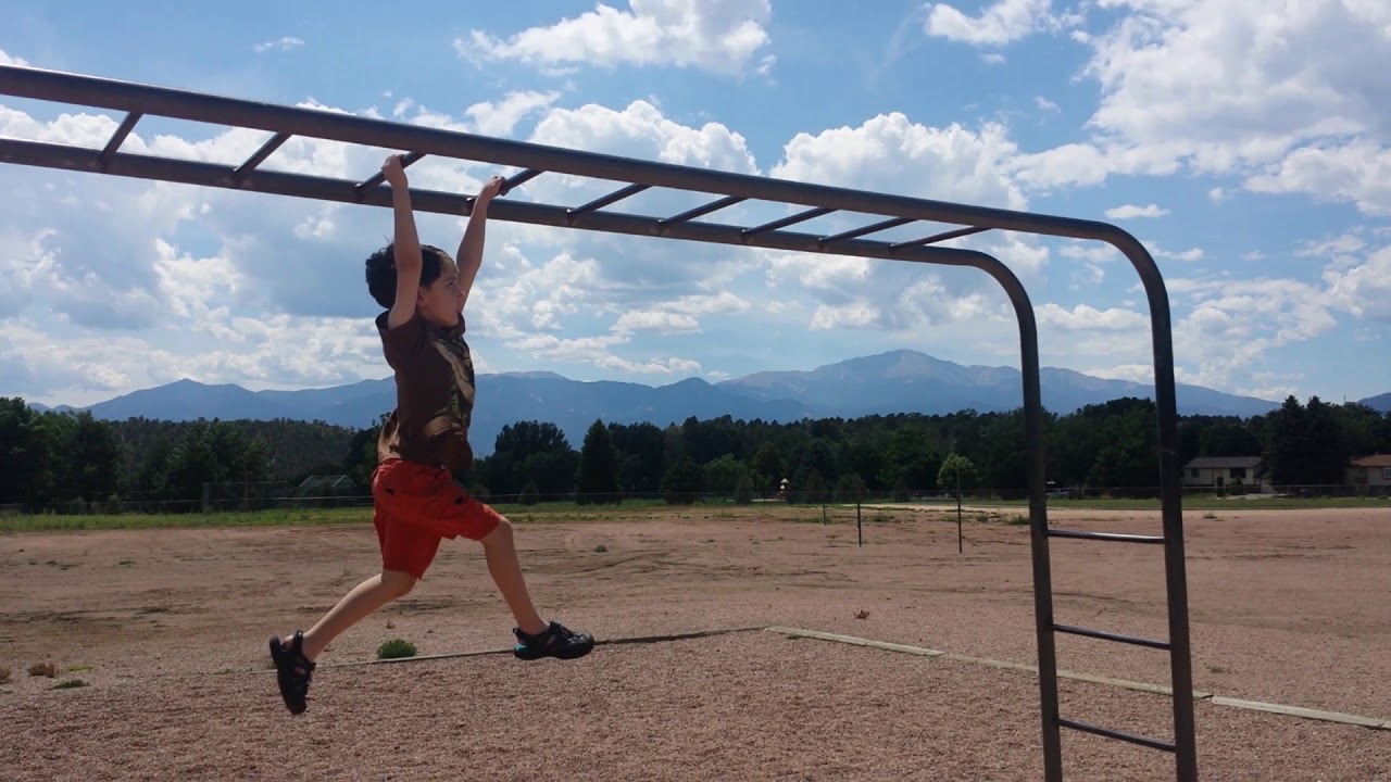 8 year olds first time monkey bars - YouTube