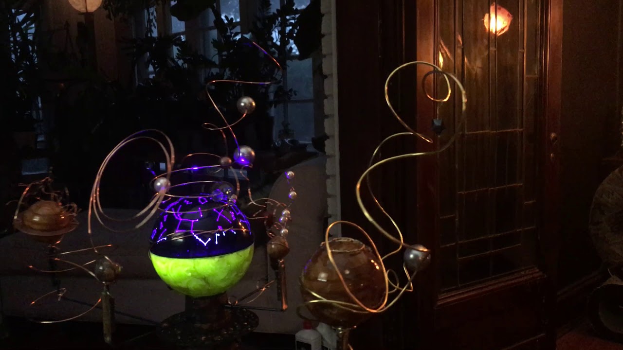 Kinetic planetary solar system sculpture - YouTube