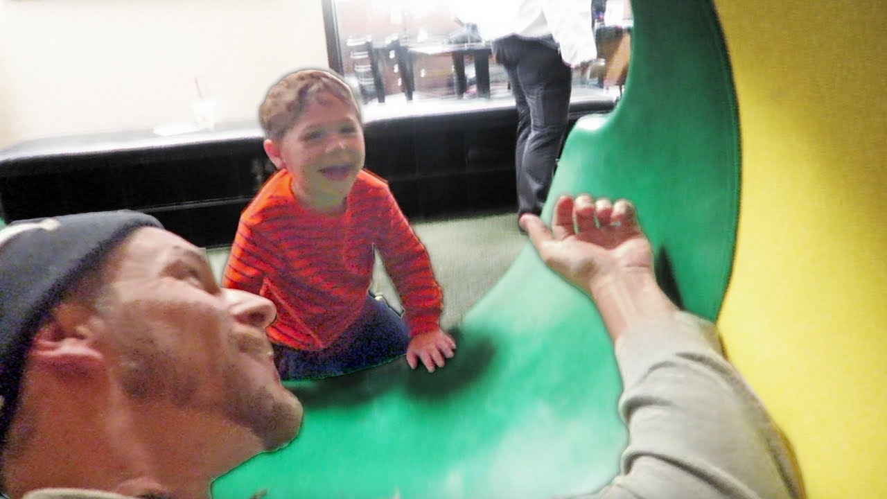 Big guy in a Chick-fil-A slide - YouTube